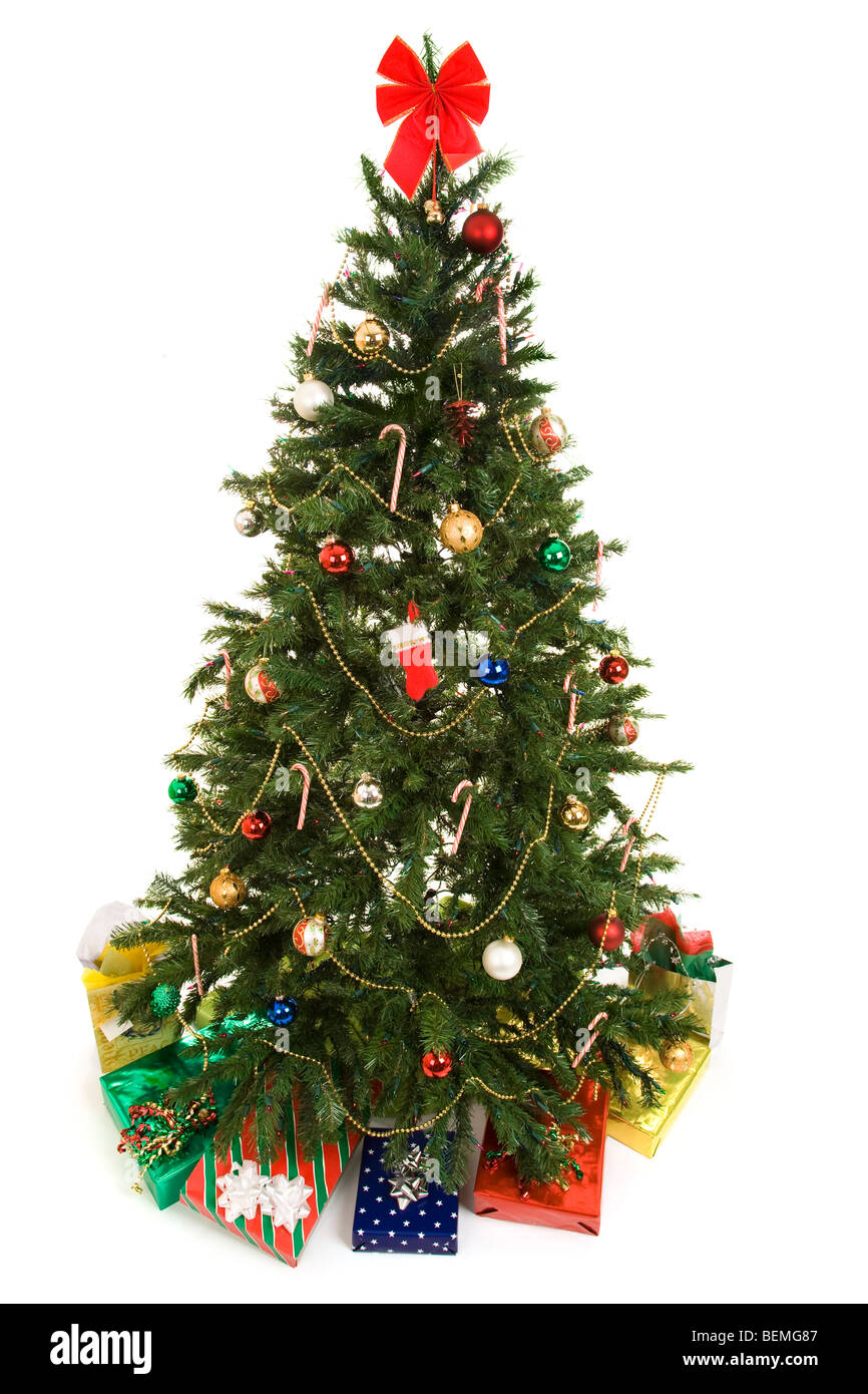 Beautiful decorated Christmas tree with colorful gifts underneath ...