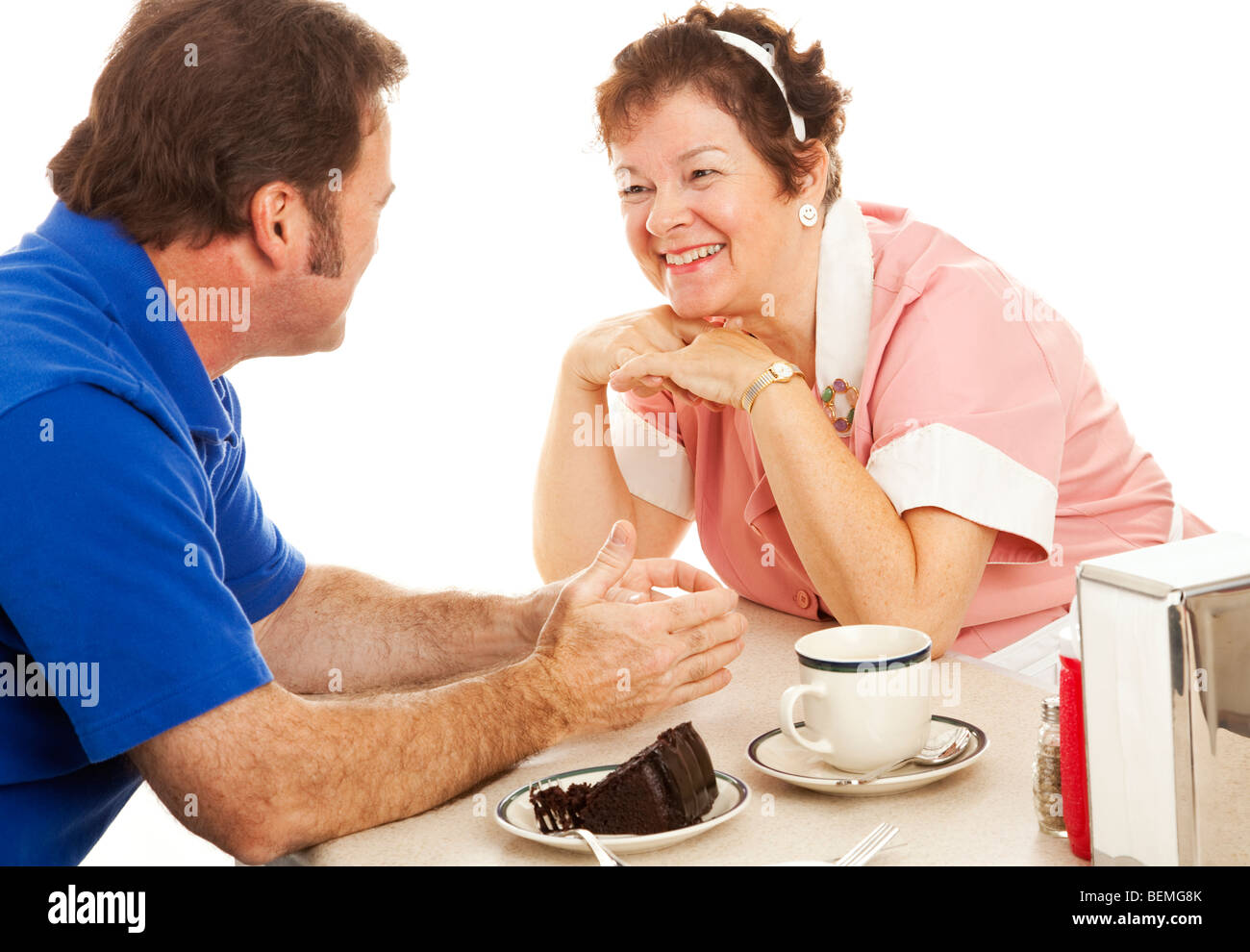 Friendly man listens to customer hi-res stock photography and images ...