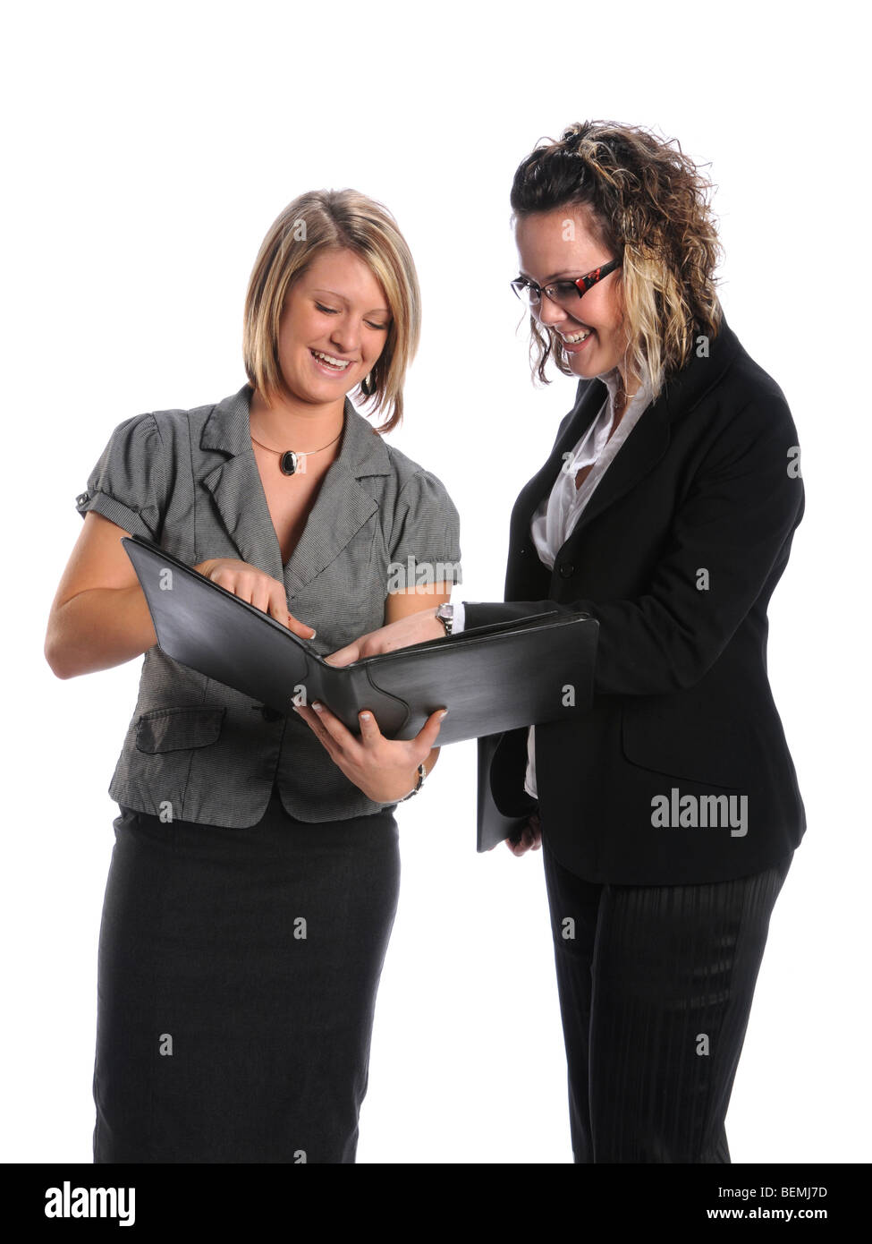 Businesswomen sharing information isolated over white background Stock ...