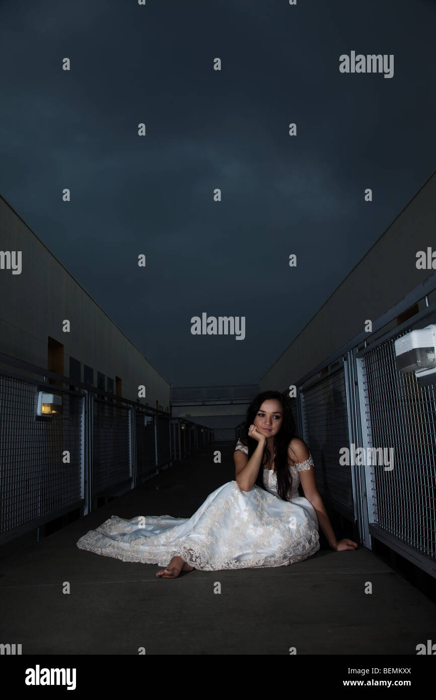 Attractive twenties russian caucasian brunette woman wearing wedding gown Stock Photo - Alamy