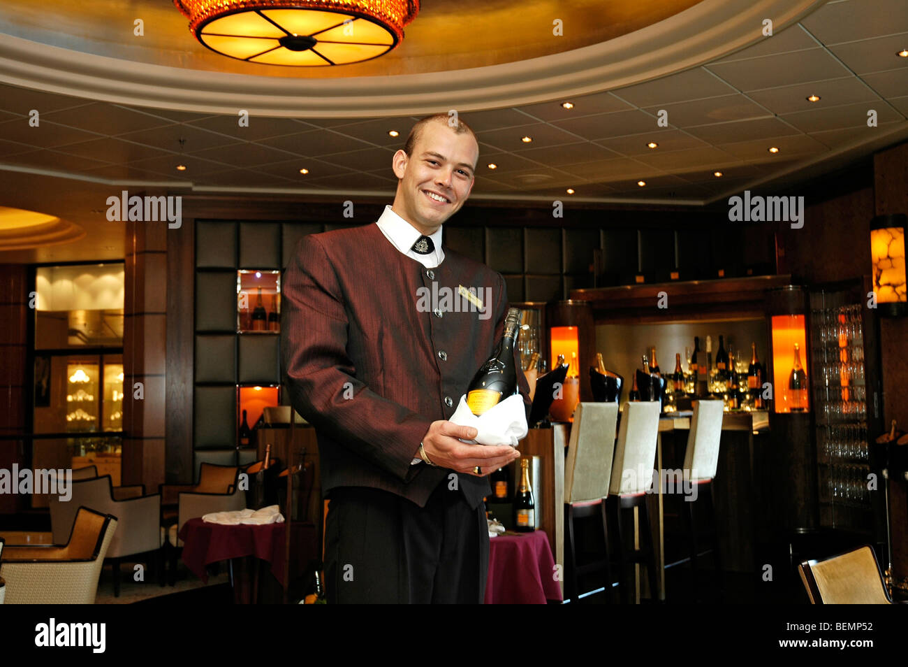 Waiter presenting wine hi-res stock photography and images - Alamy