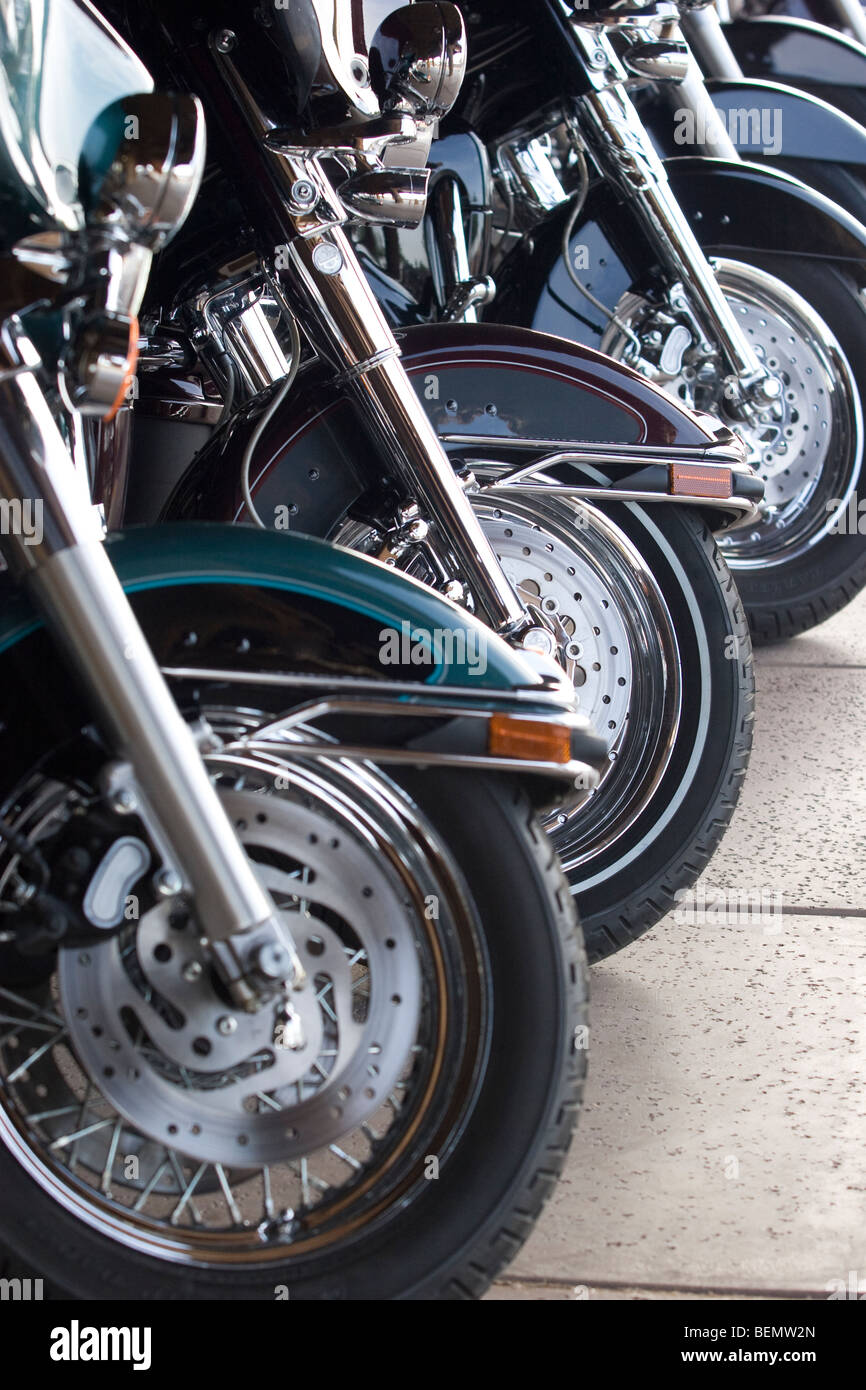 Motorcycles lined up in a row Stock Photo - Alamy