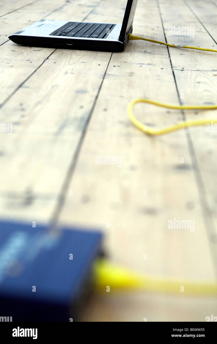 Laptop Computer and network hub Stock Photo - Alamy