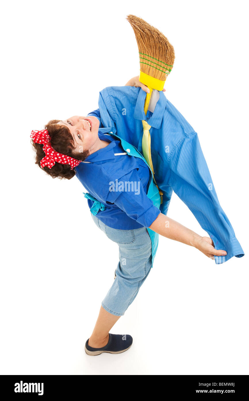 Lonely housekeeper has dressed her broom like a man and is dancing with ...