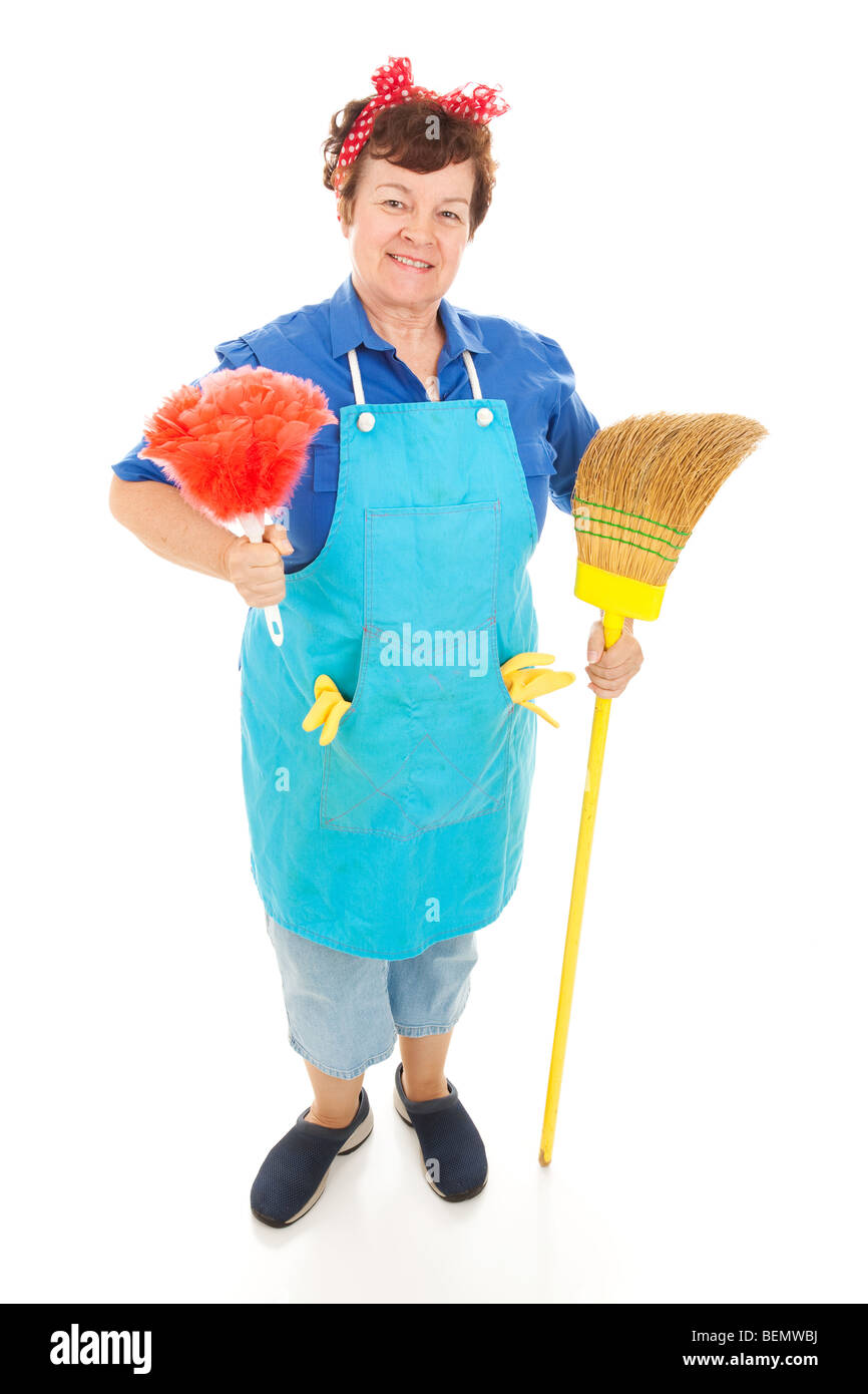 Friendly housekeeper ready to work, holding her broom and feather ...