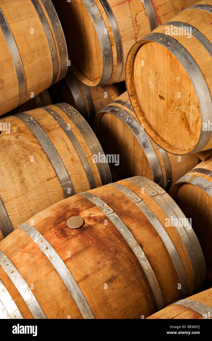 Stacked wine barrels holding last season's harvest Stock Photo - Alamy