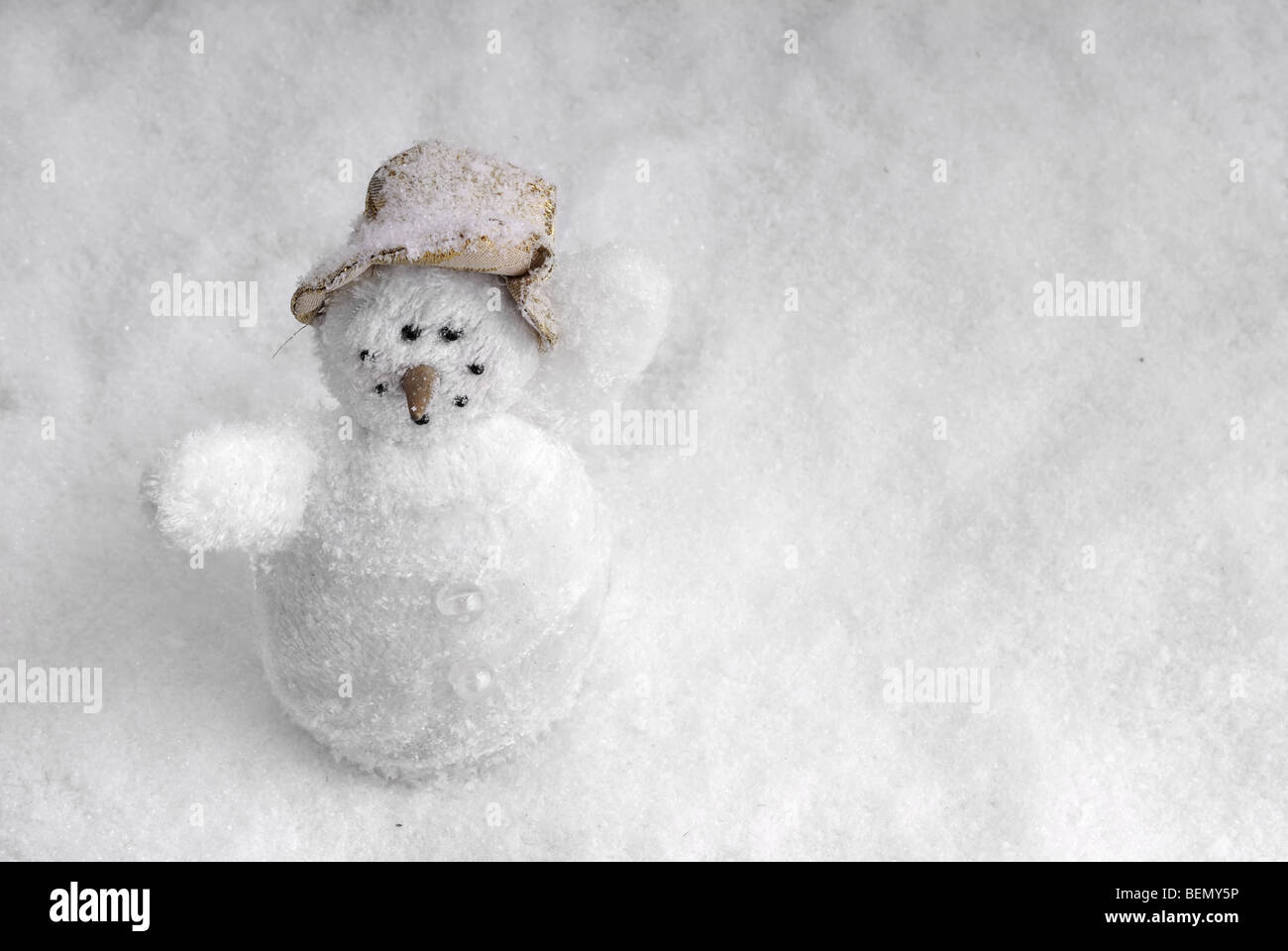 snowman in snow landscape Stock Photo - Alamy