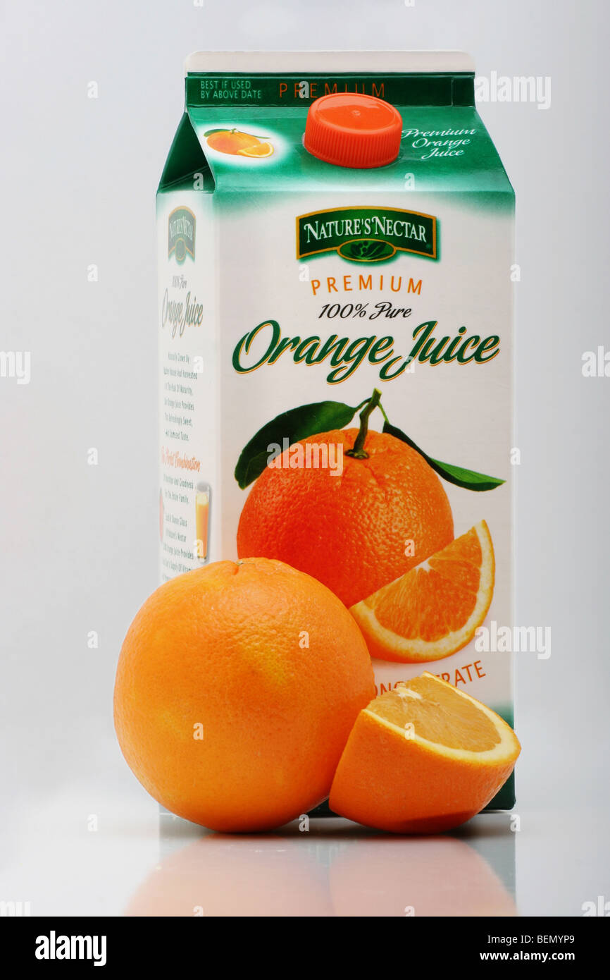 Orange Juice in carton with whole and a quarter orange cut out cutout ...