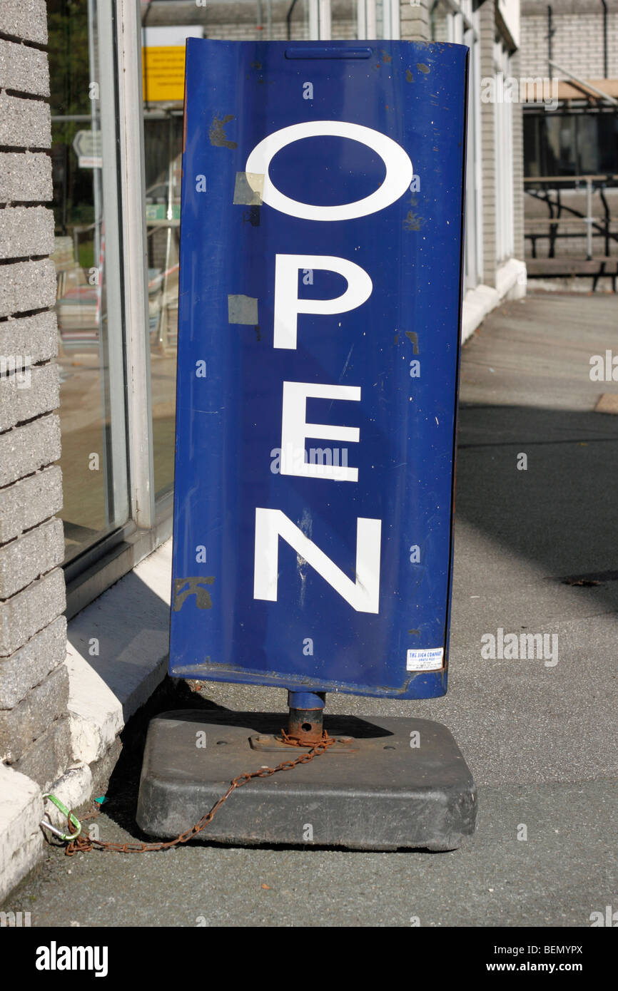 Open sign outside of a shop Stock Photo - Alamy