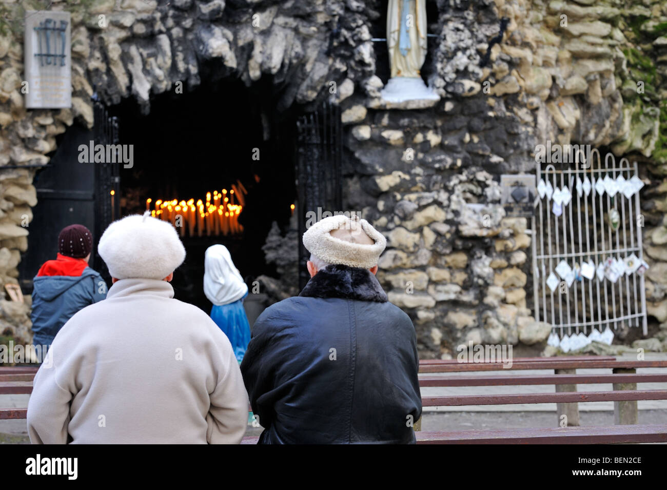 People praying at the Lourdes grotto, Oostakker-Lourdes place of ...