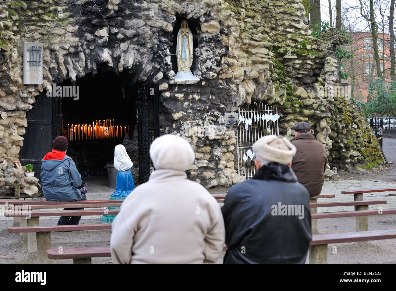 People praying at the Lourdes grotto, Oostakker-Lourdes place of ...