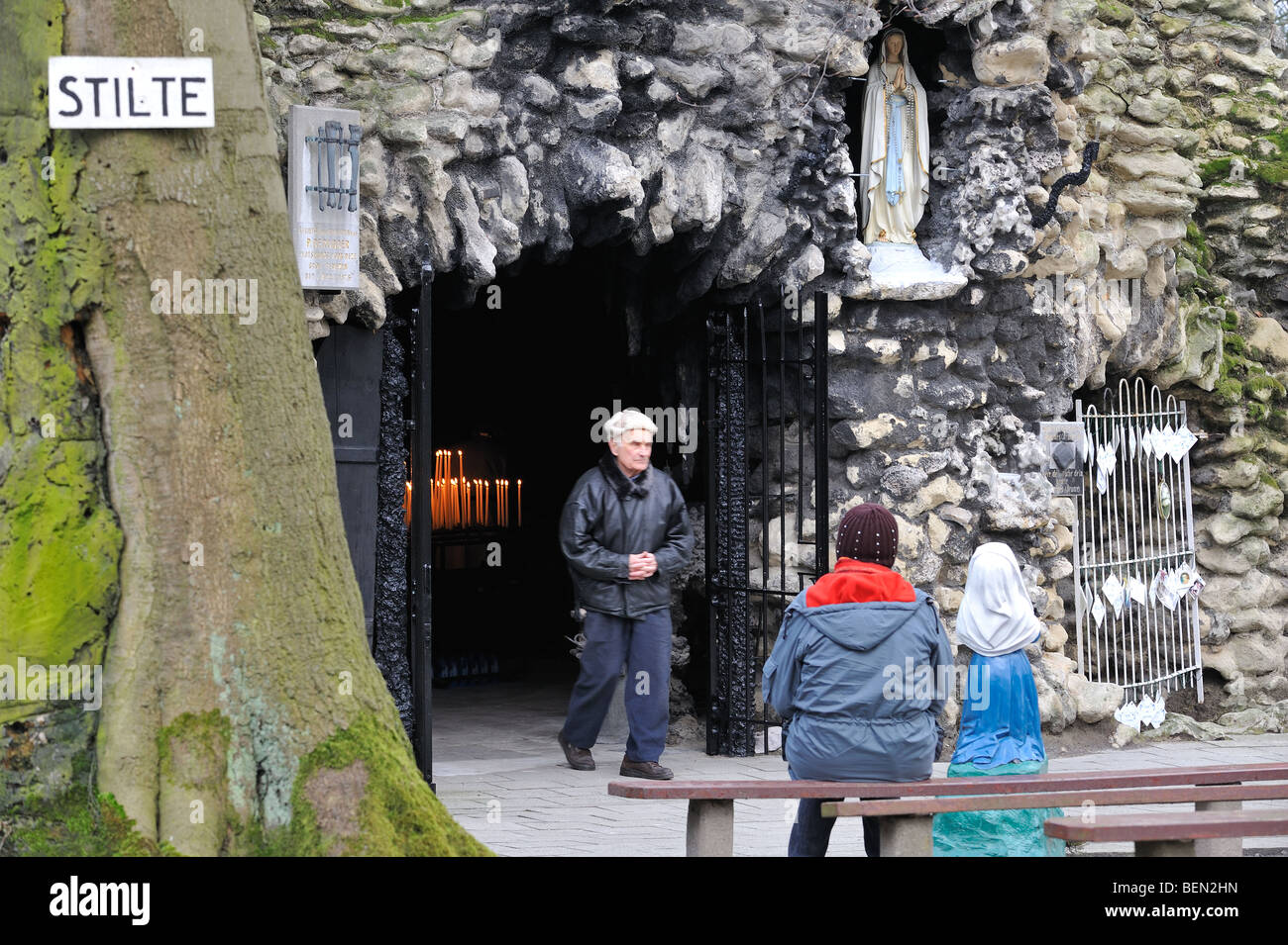 People praying at the Lourdes grotto, Oostakker-Lourdes place of ...