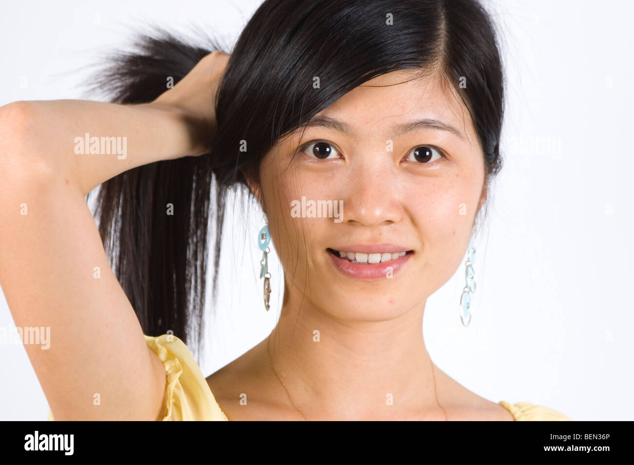 Pretty Asian model, young teenager, student from China. Girl with kind ...