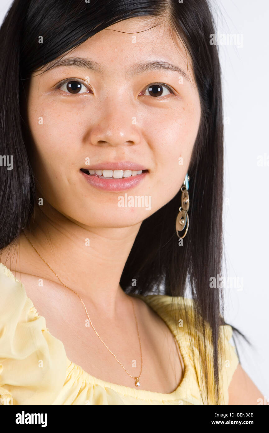 Pretty Asian model, young teenager, student from China. Girl with kind ...