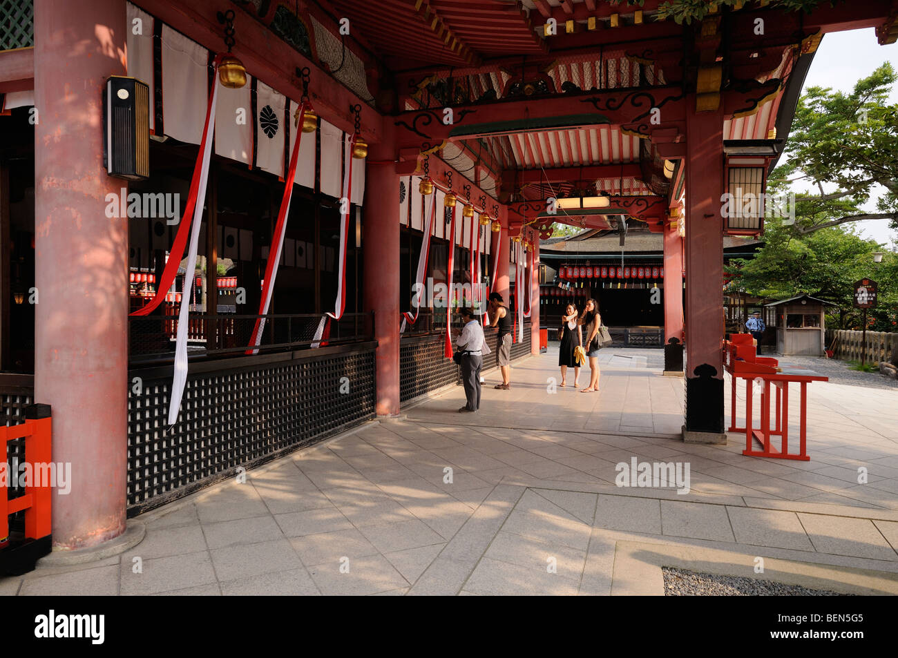 Prayers on the Haiden (Praying Hall). Main Hall complex of Fushimi ...