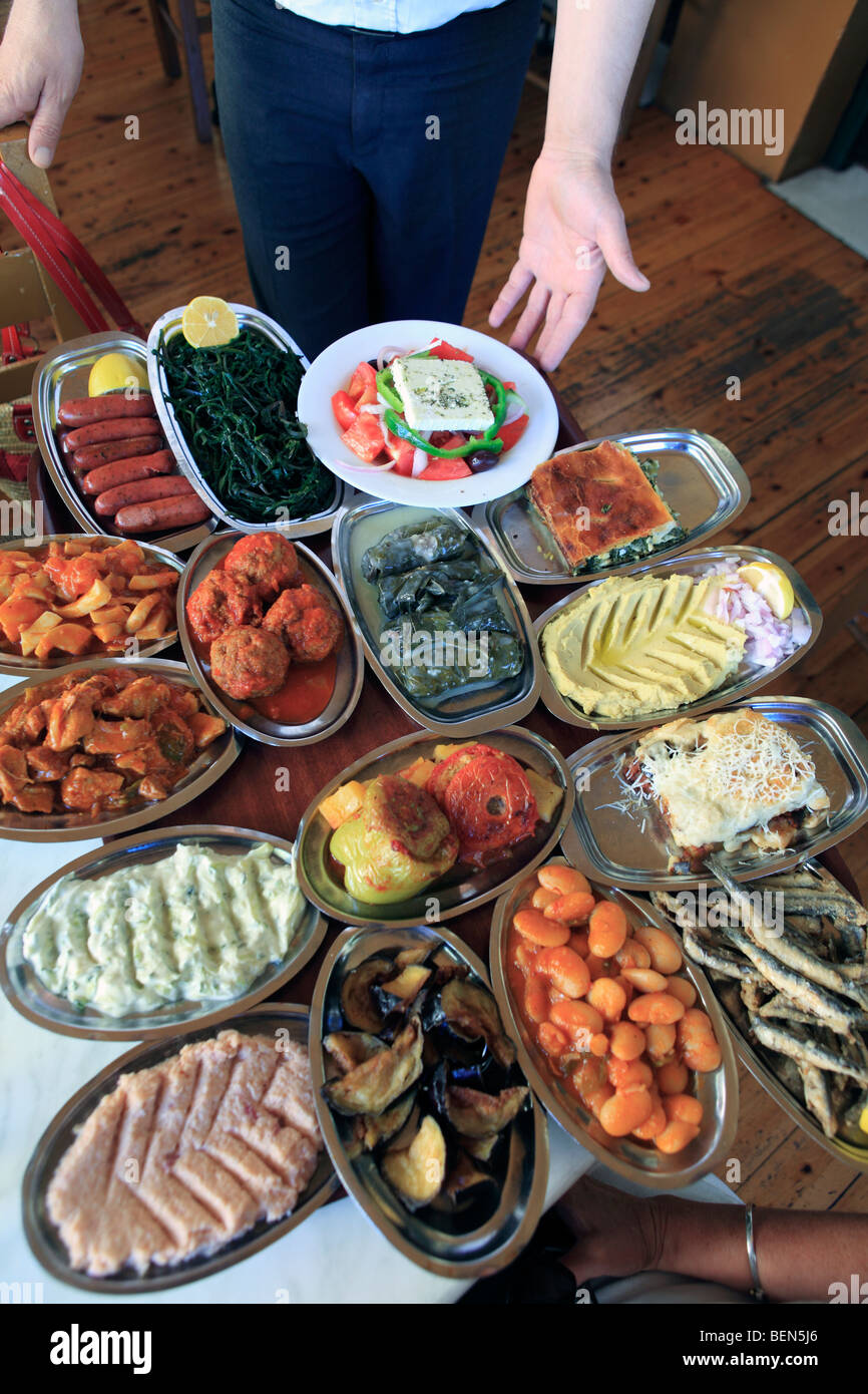 Greek waiter plates hi-res stock photography and images - Alamy