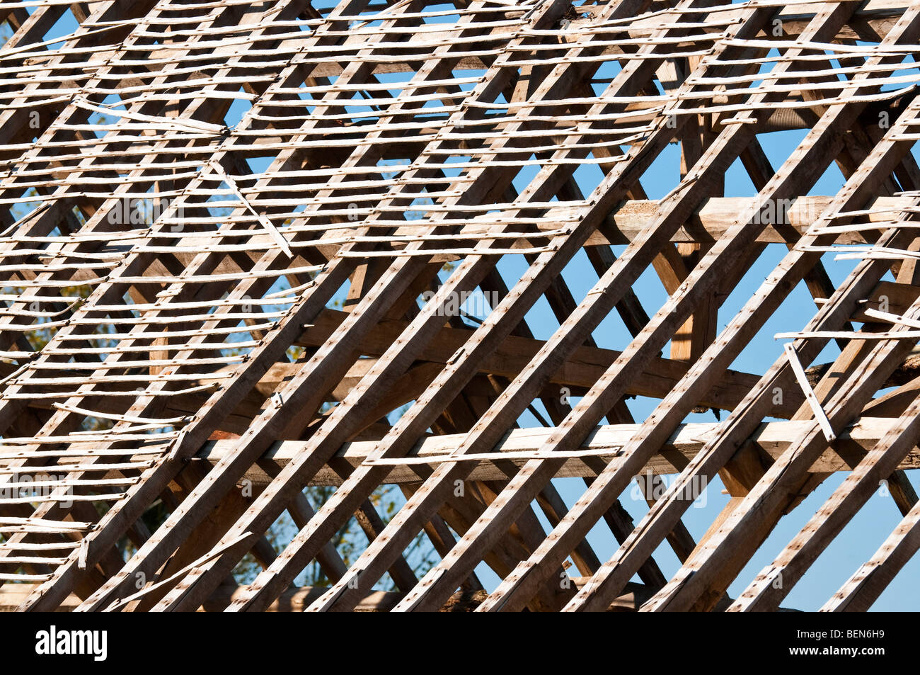 Storm damaged barn roof with tiles missing - France Stock Photo - Alamy