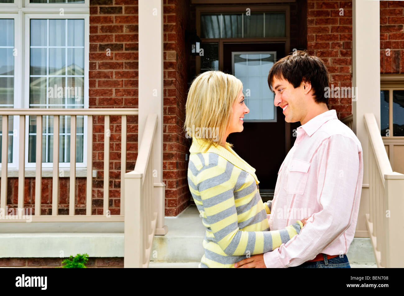 Young happy couple in love at home Stock Photo - Alamy