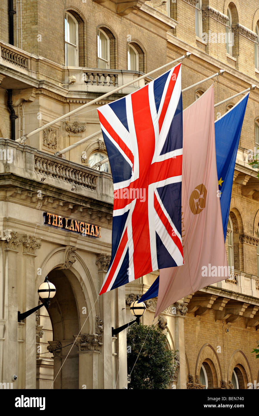 Flags outside the Langham Hotel Stock Photo - Alamy