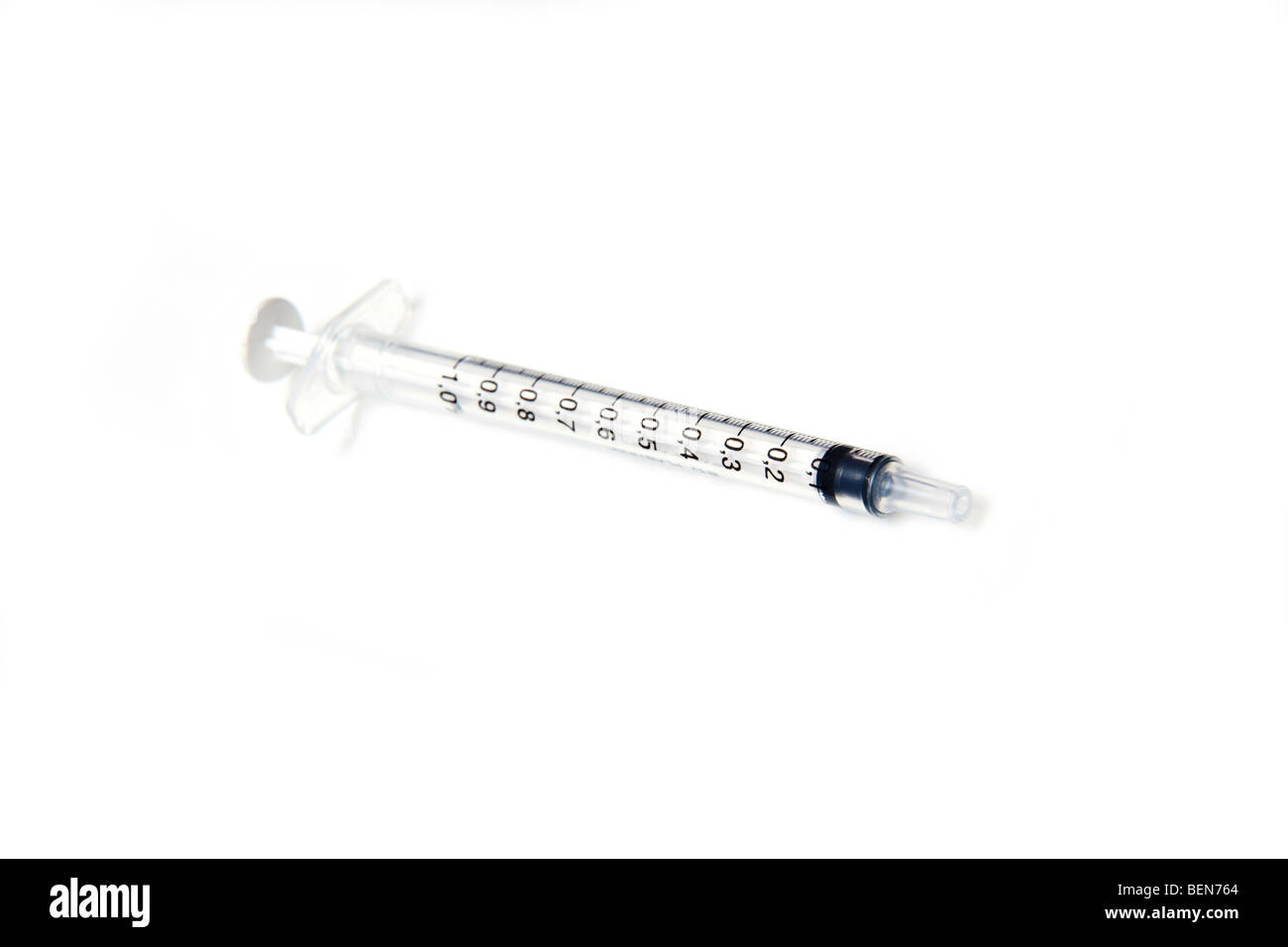 Plastic syringe isolated on a white studio background Stock Photo - Alamy