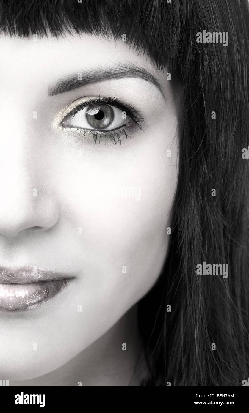 half face portrait of beautiful brunette girl Stock Photo - Alamy