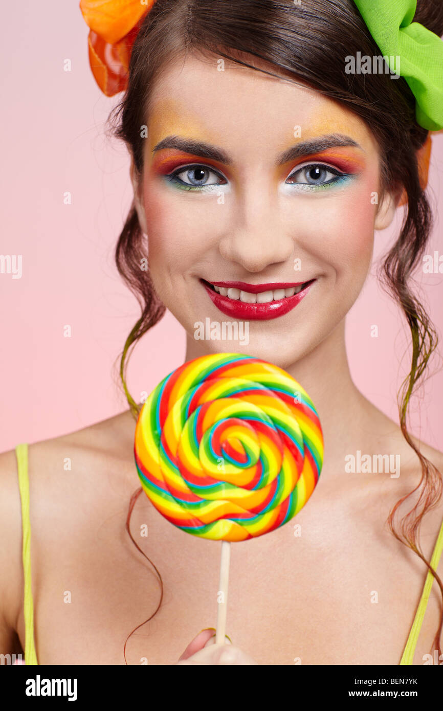portrait of beautiful girl with big lollipop Stock Photo - Alamy