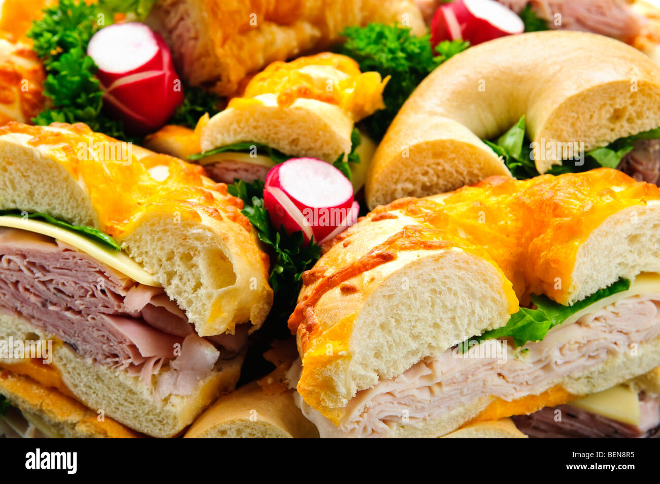 Assorted bagel sandwich platter with meat and vegetables Stock Photo ...