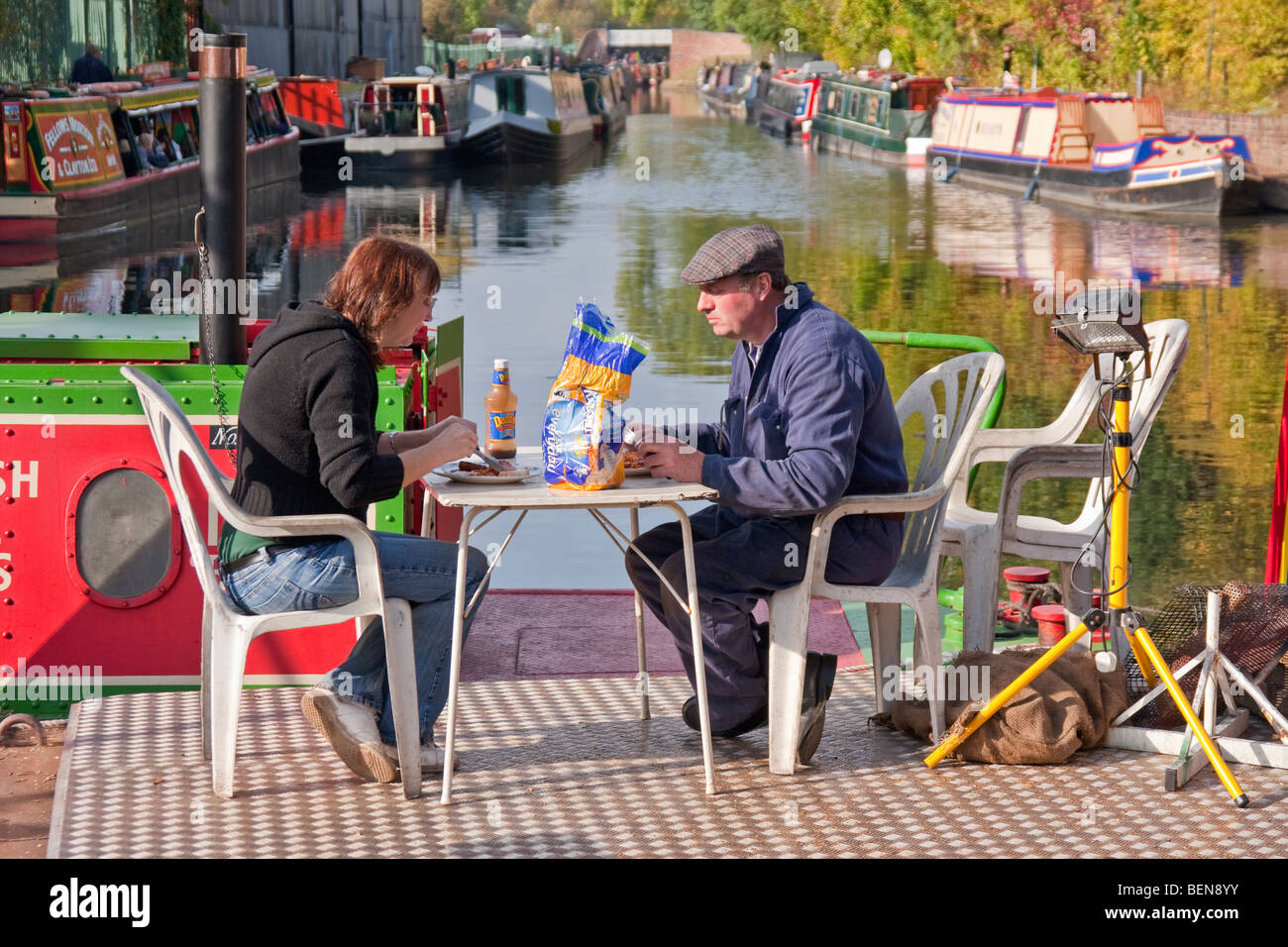 couple taking breakfast on the back of a floating platform Stock Photo ...