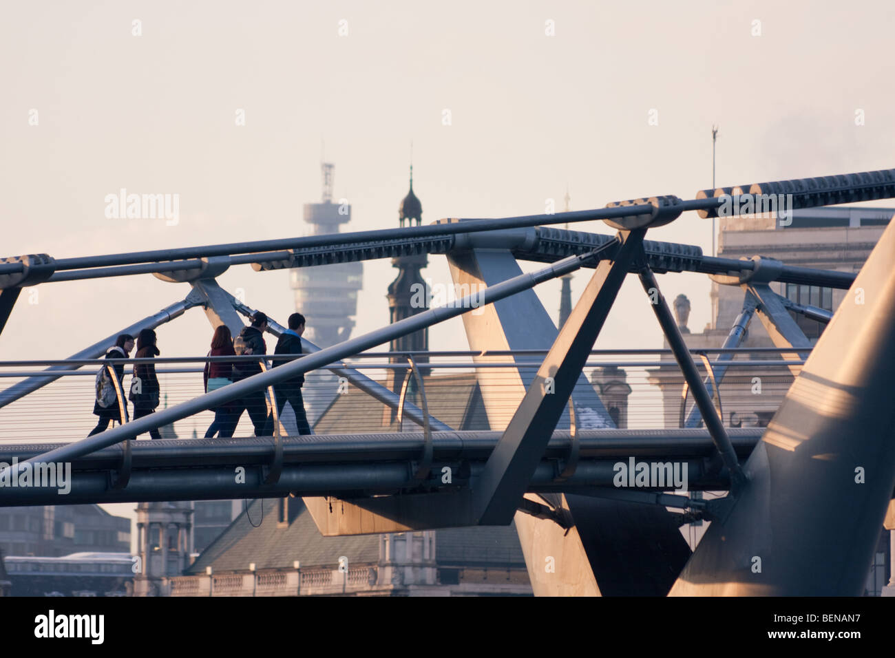 Crossing the millennium bridge hi-res stock photography and images - Alamy