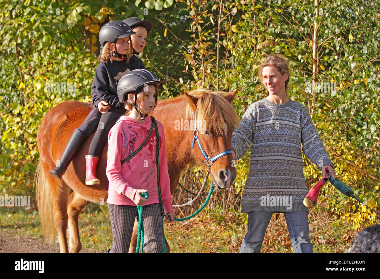 Mother daughter pony girl riding hi-res stock photography and images ...