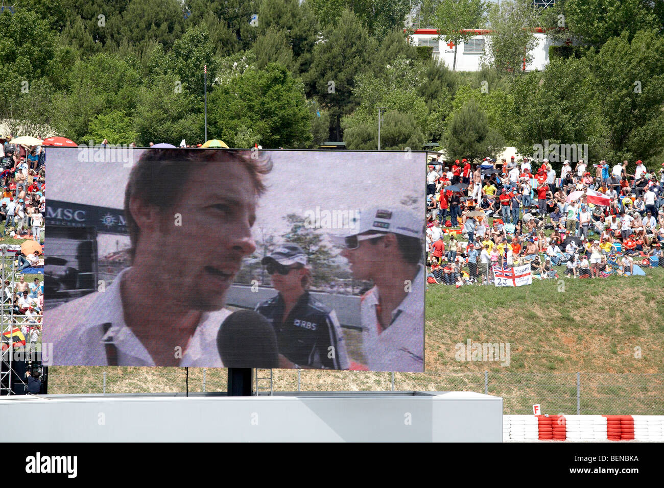 Big screen showing an interview with Jensen Button before the race ...