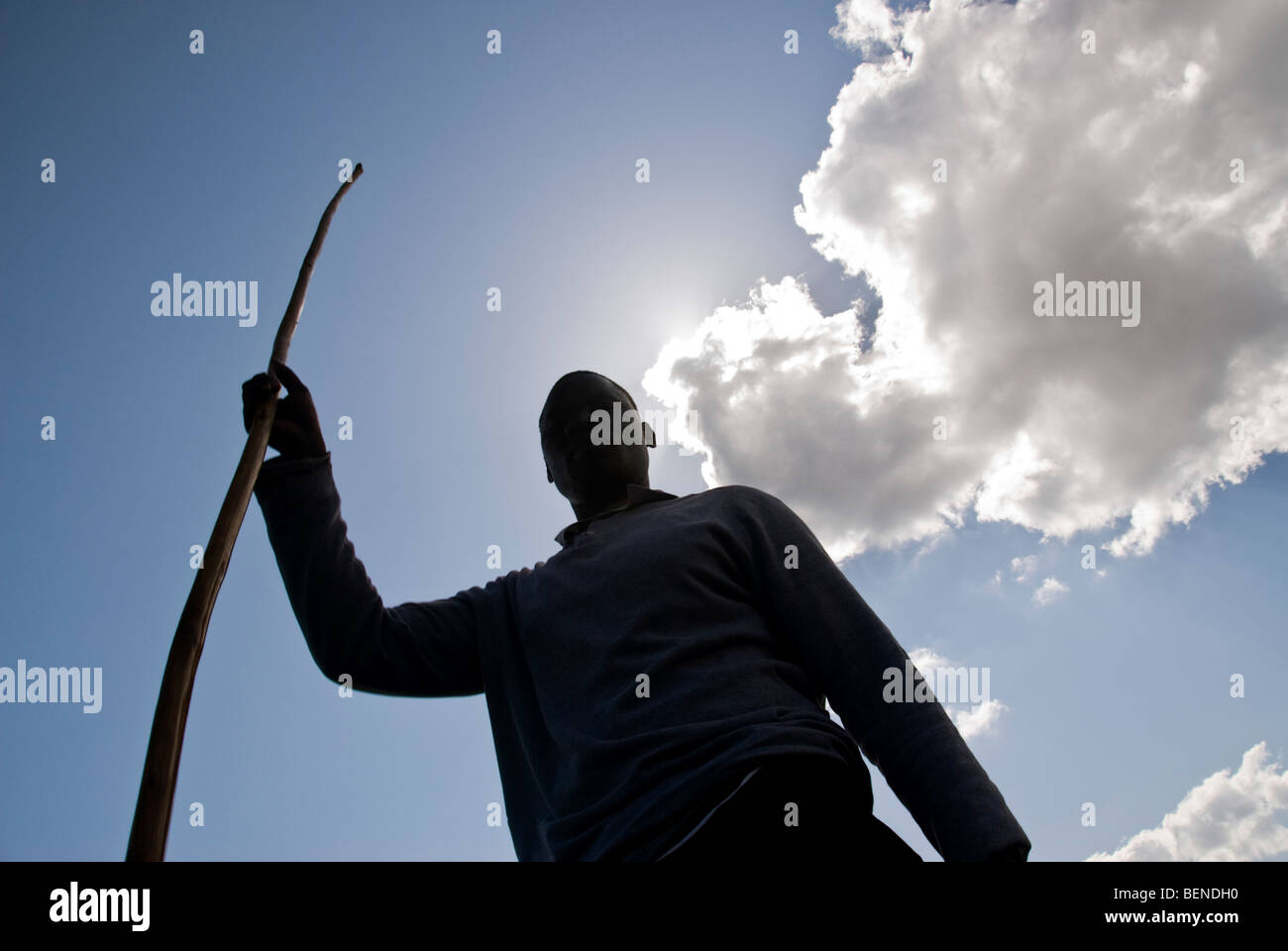 Mokoro poler´s silhouette against the sun. Okavango delta, Botswana ...