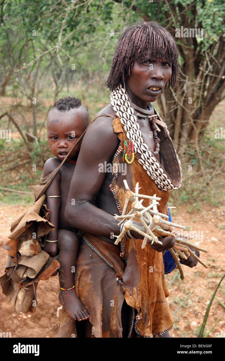 Woman of the Hamar tribe carrying child on her back, Omo Valley ...