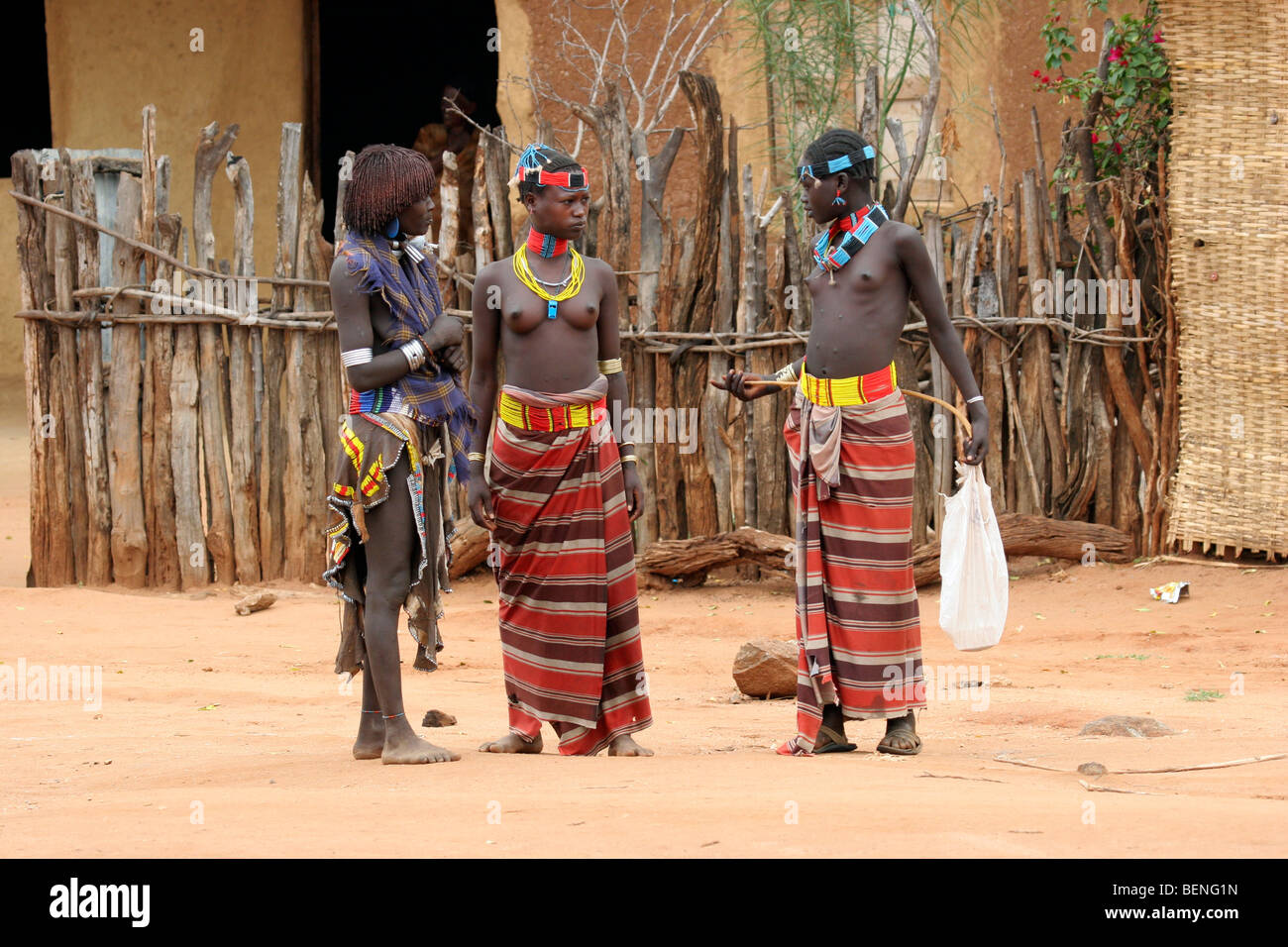 Three young native black women of the Bana / Bena tribe wearing ...