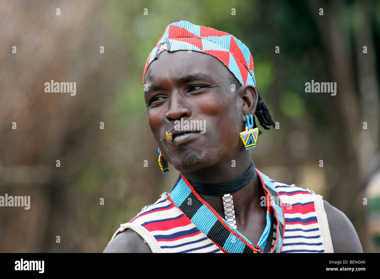 Man of the Bana / Bena tribe in traditional dress wearing colourful ...