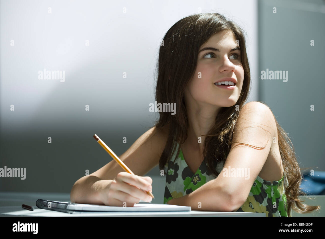 Teenage girl writing on whiteboard hi-res stock photography and images ...