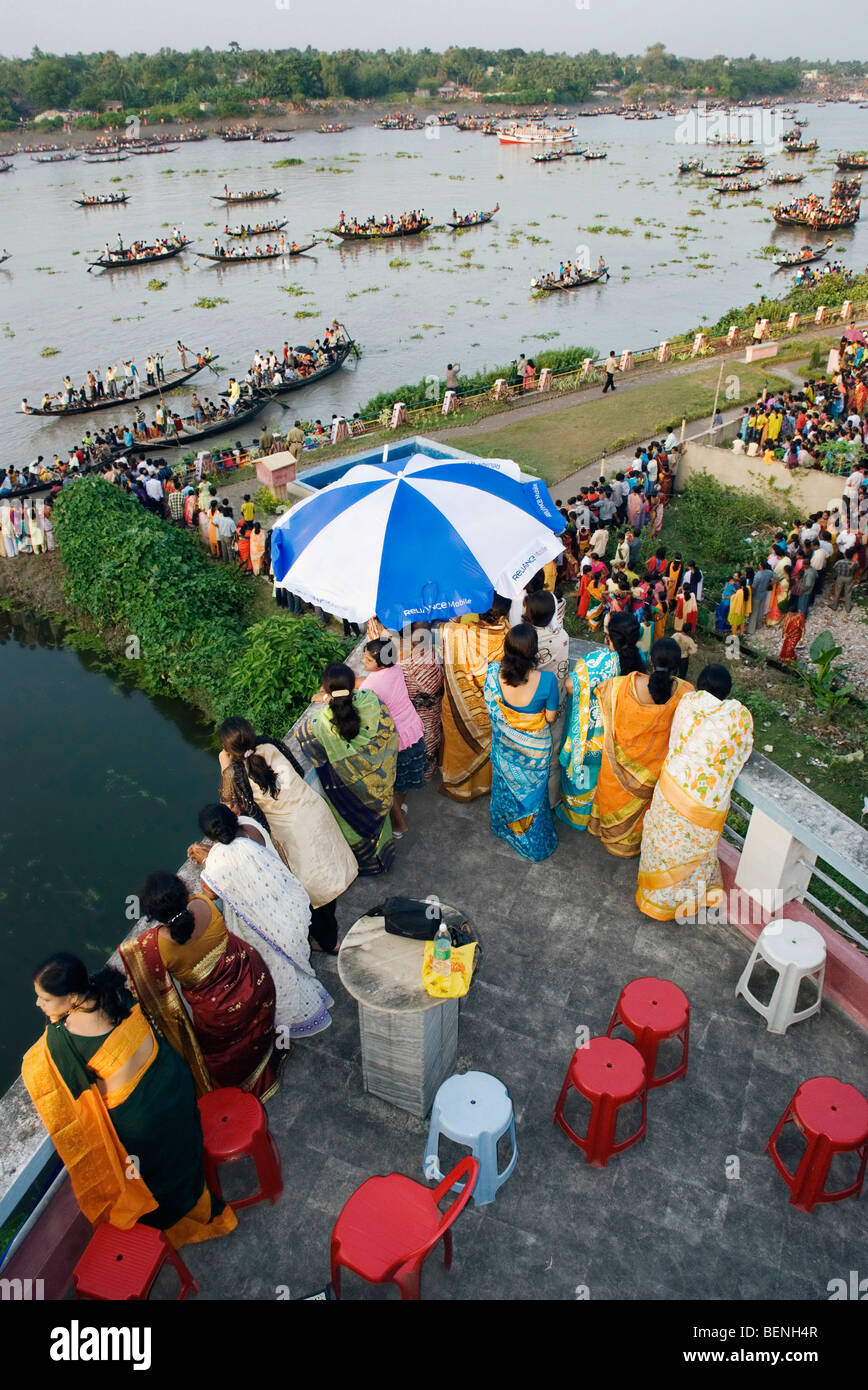 People watching Durga idol immersion in Icchamati river Bashirhat North ...