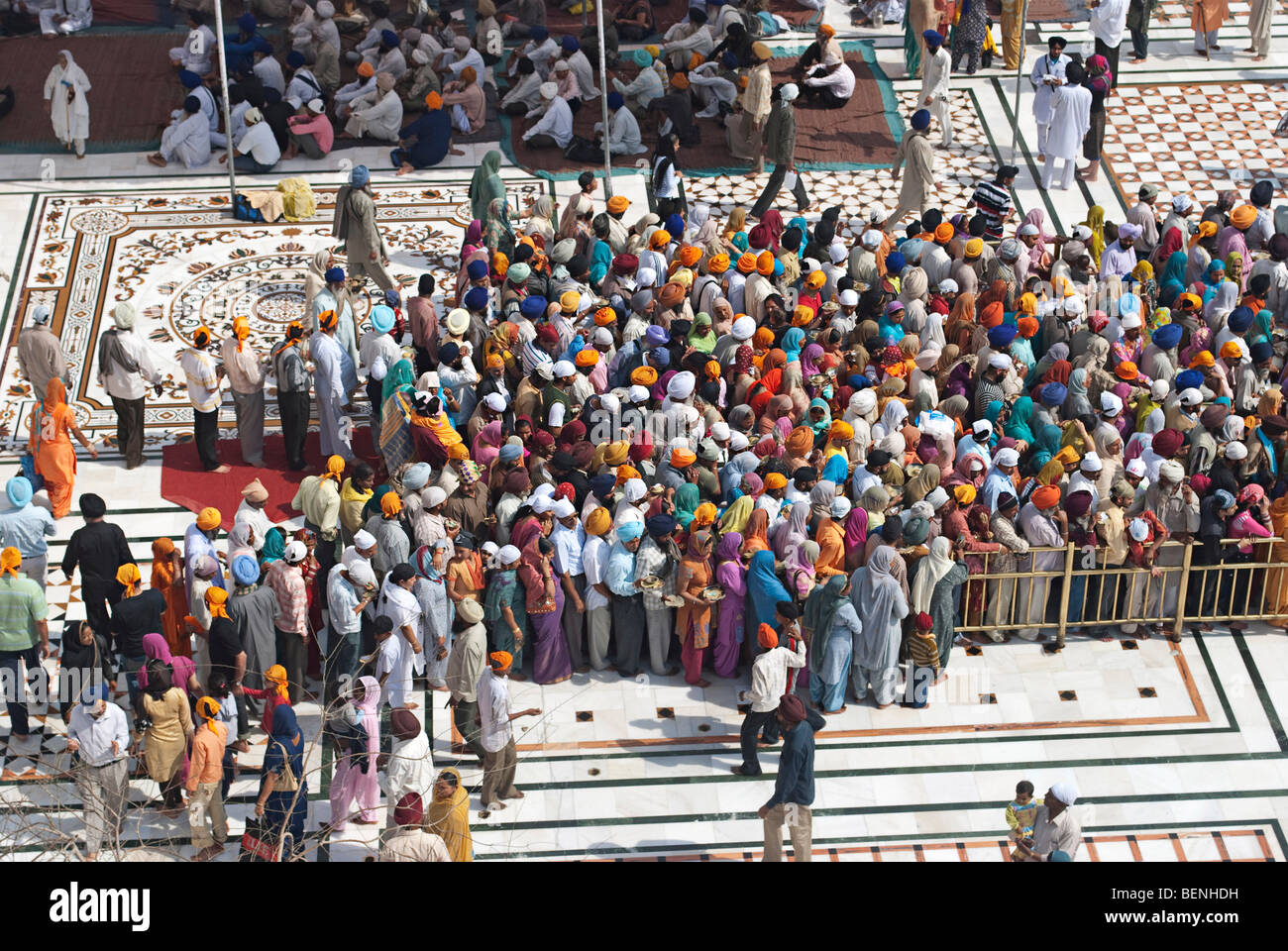 Devotee at golden temple hi-res stock photography and images - Alamy