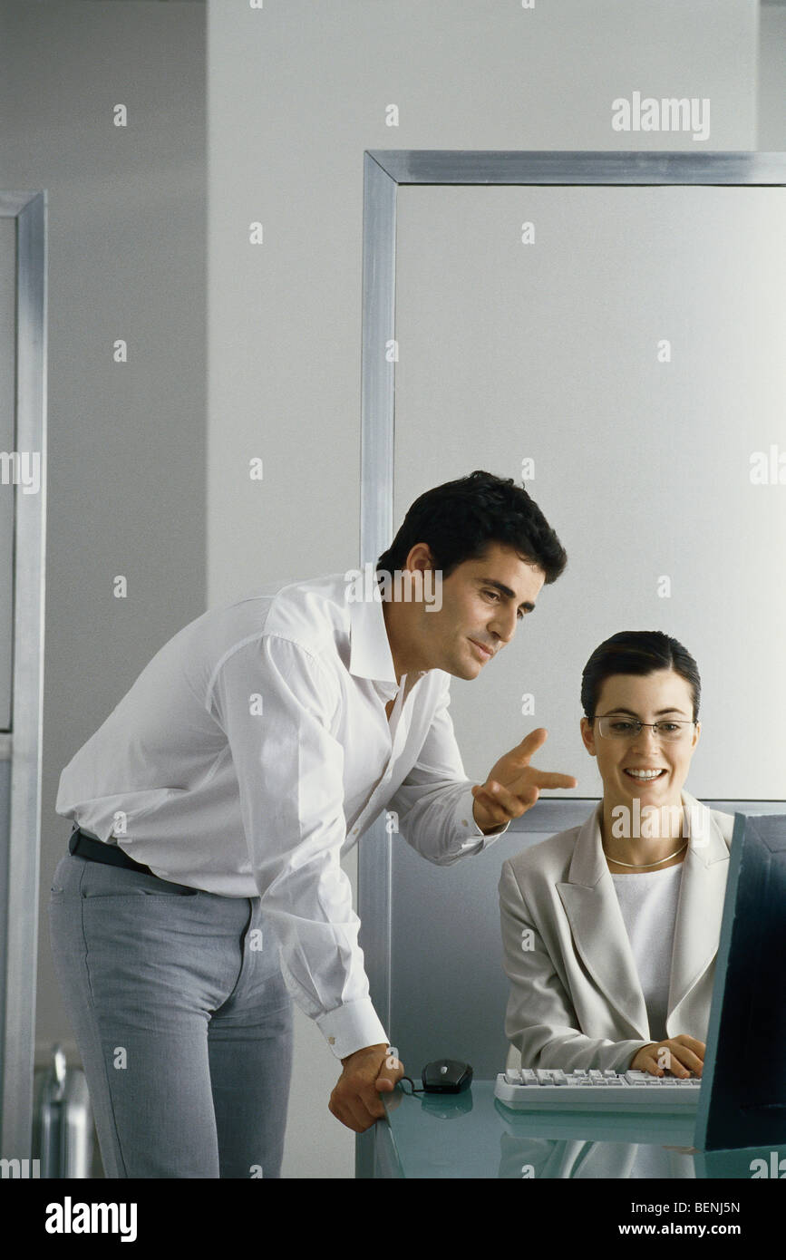 Woman lean over man office hi-res stock photography and images - Alamy
