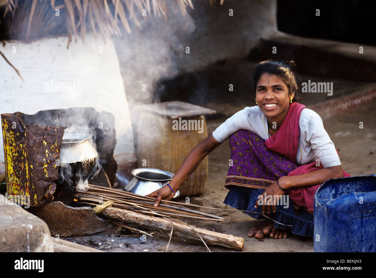 A village woman cooking in the Nilgiris Tamil Nadu India Stock Photo ...