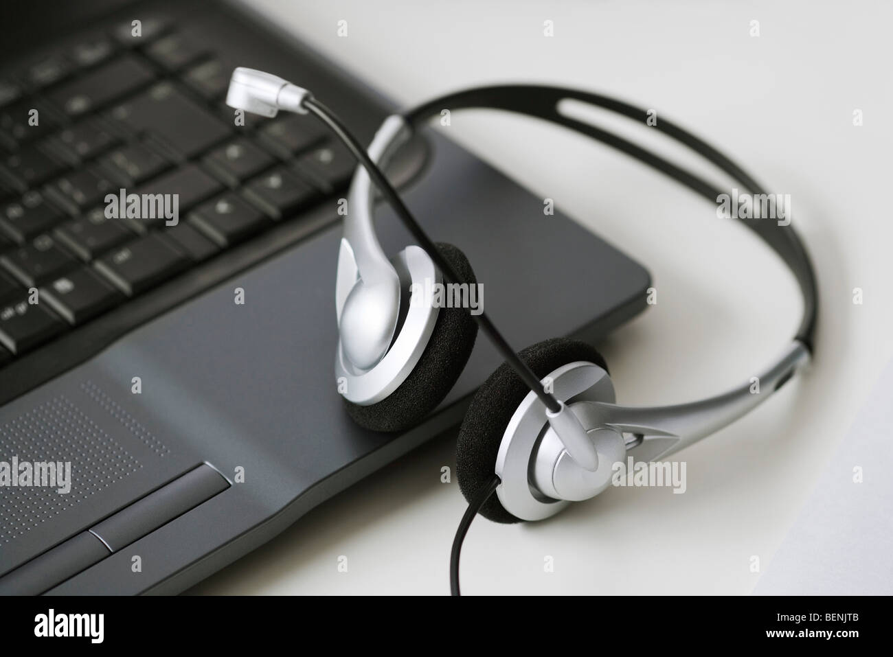 Headset and laptop computer Stock Photo - Alamy