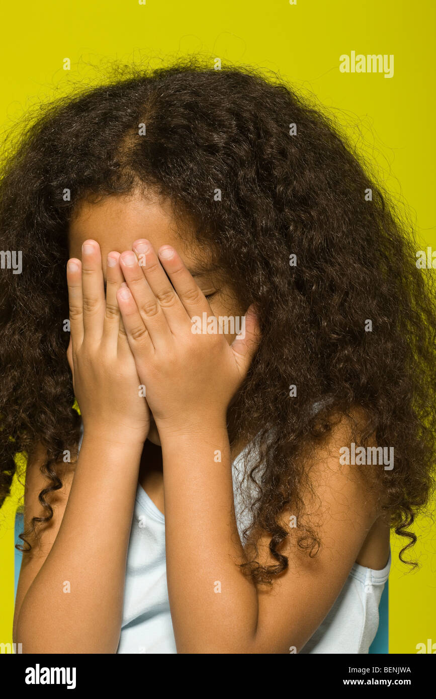 Hands covering face black girl child hi-res stock photography and ...