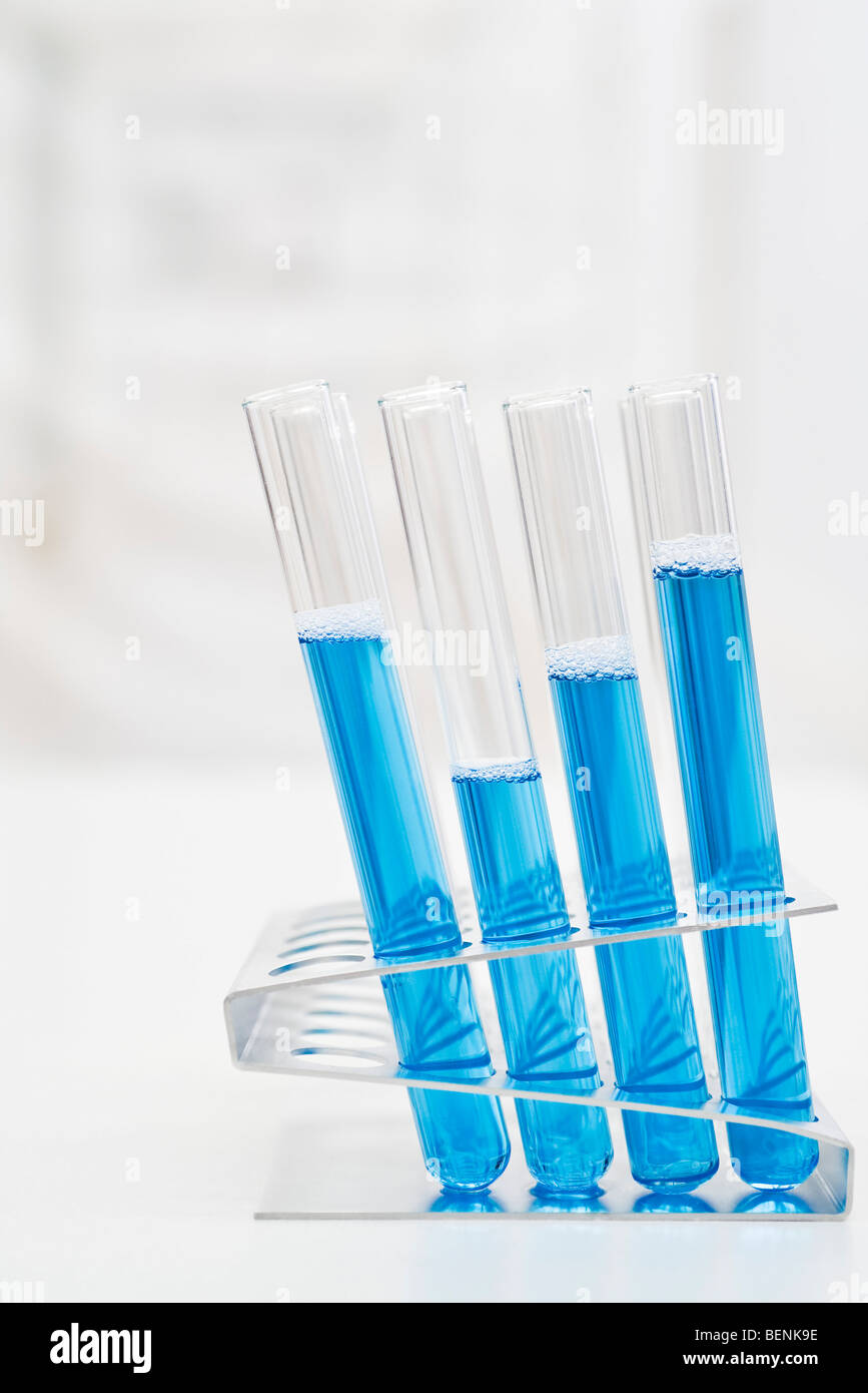 Test tubes containing blue liquid Stock Photo - Alamy