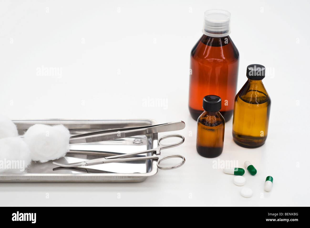 Medical tray with forceps, tweezers, medicine bottles, capsules Stock ...