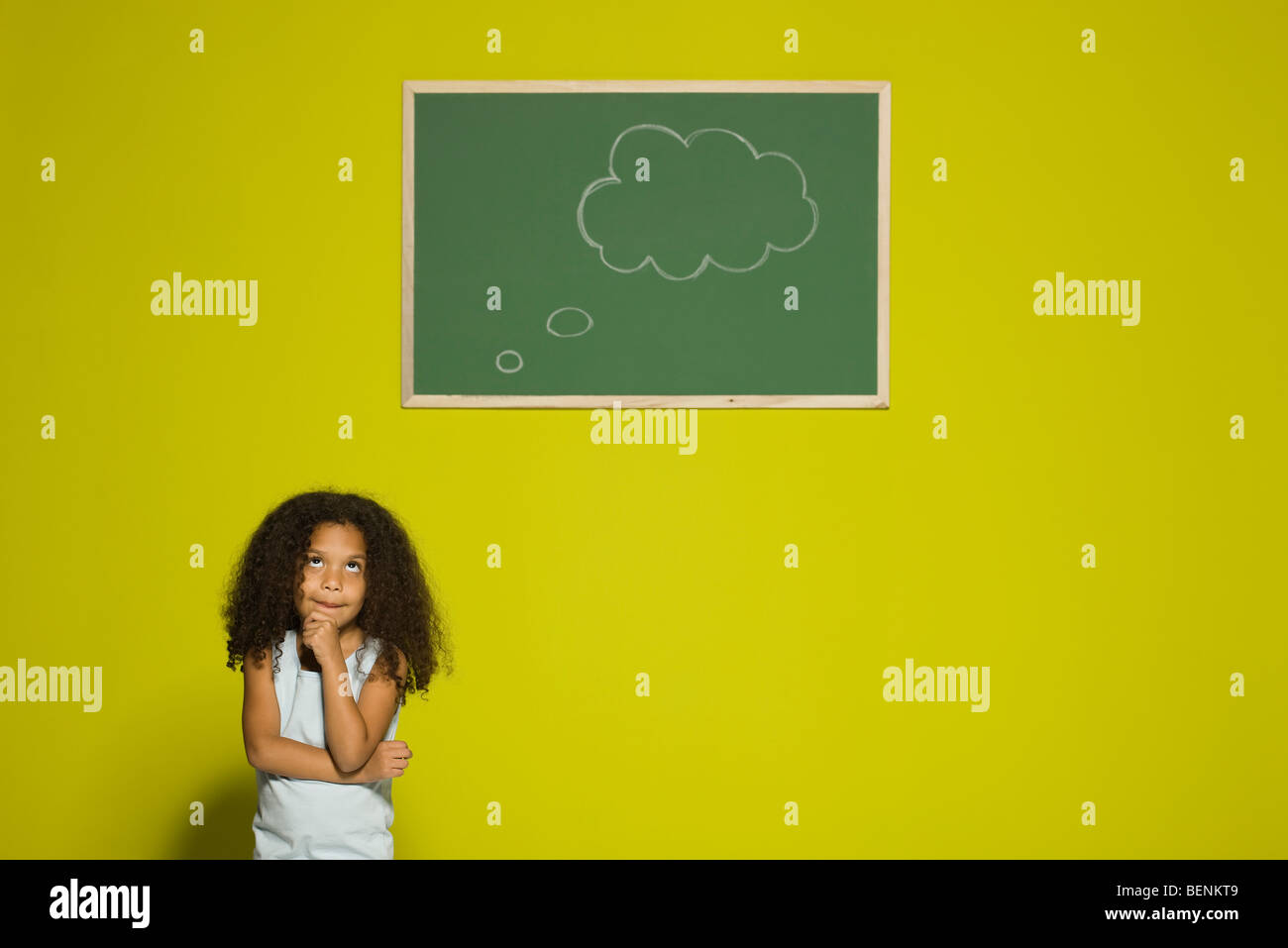 Little girl thinking, empty thought bubble on chalkboard overhead Stock ...