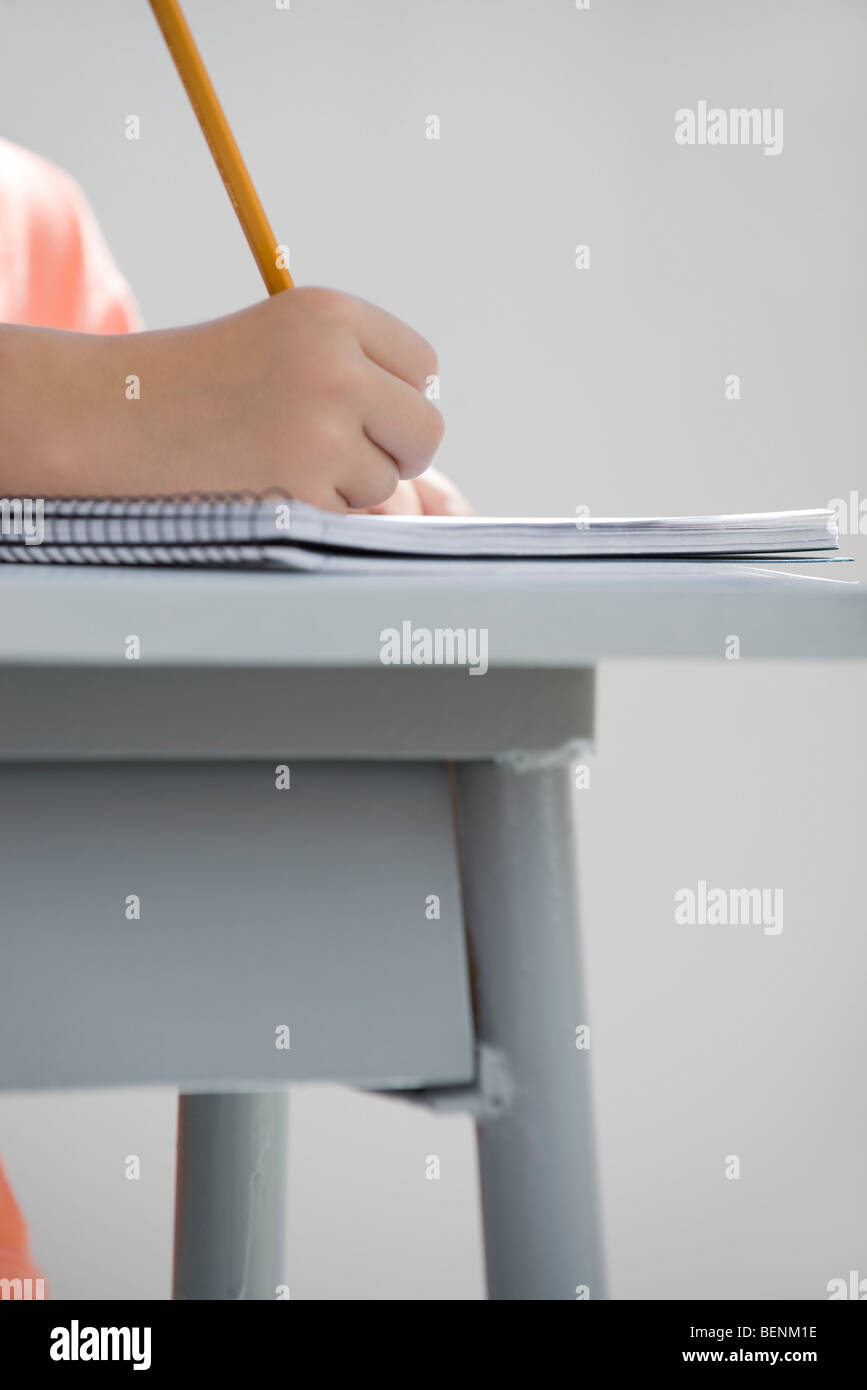 Kid writing in spiral notebook hi-res stock photography and images - Alamy