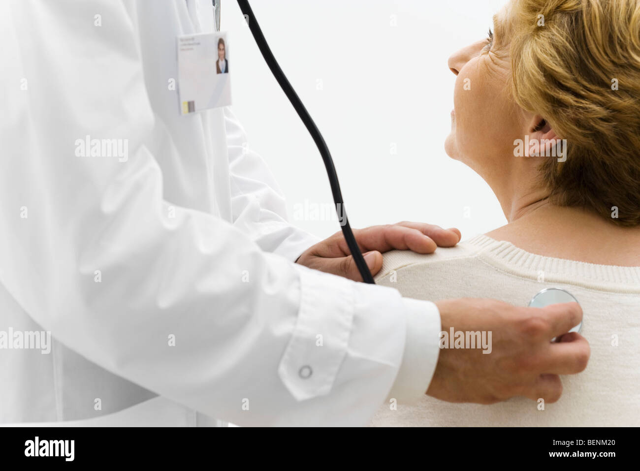 Back view woman listening unrecognizable hi-res stock photography and ...