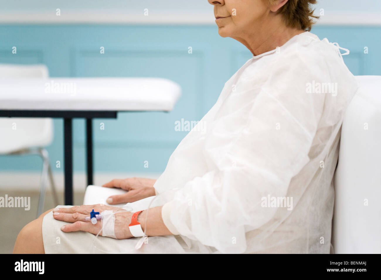 Hospital patient receiving treatment, side view, cropped Stock Photo ...