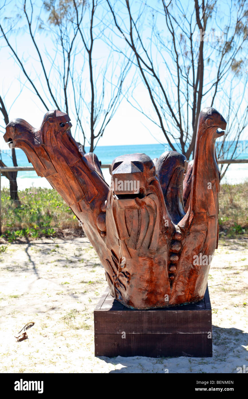 Wooden lion Sculpture on display by the ocean at a arts festival Stock ...