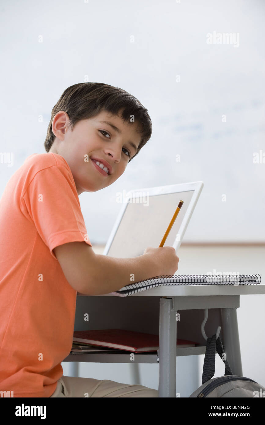 School kids on laptop in class hi-res stock photography and images - Alamy